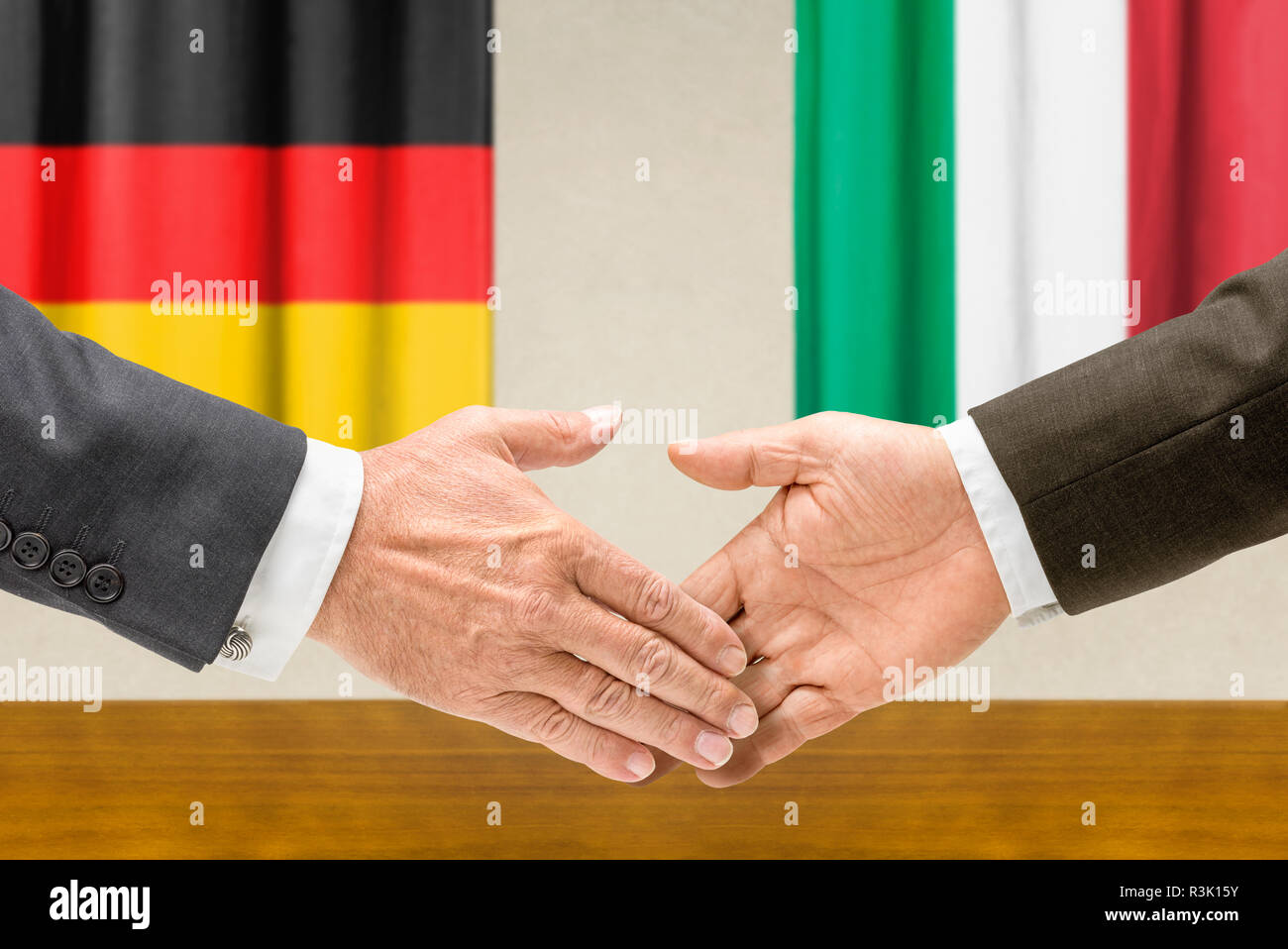 representatives of germany and italy shake hands Stock Photo - Alamy