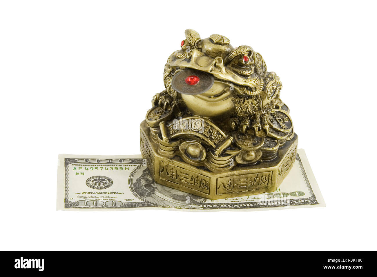 Money toad sitting on the dollar banknote Stock Photo - Alamy