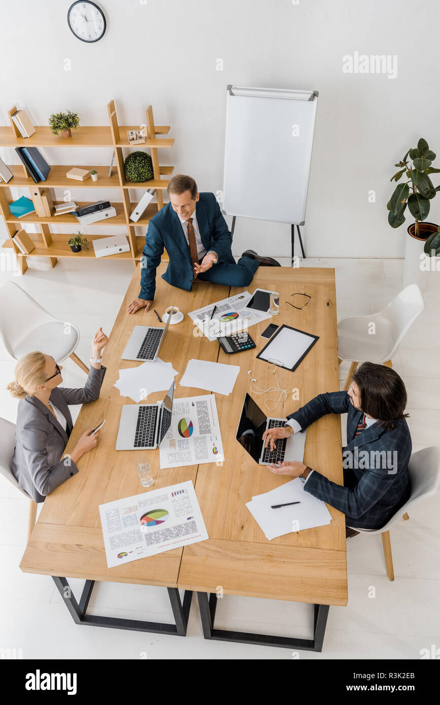 insurance workers talking at meeting in office Stock Photo - Alamy