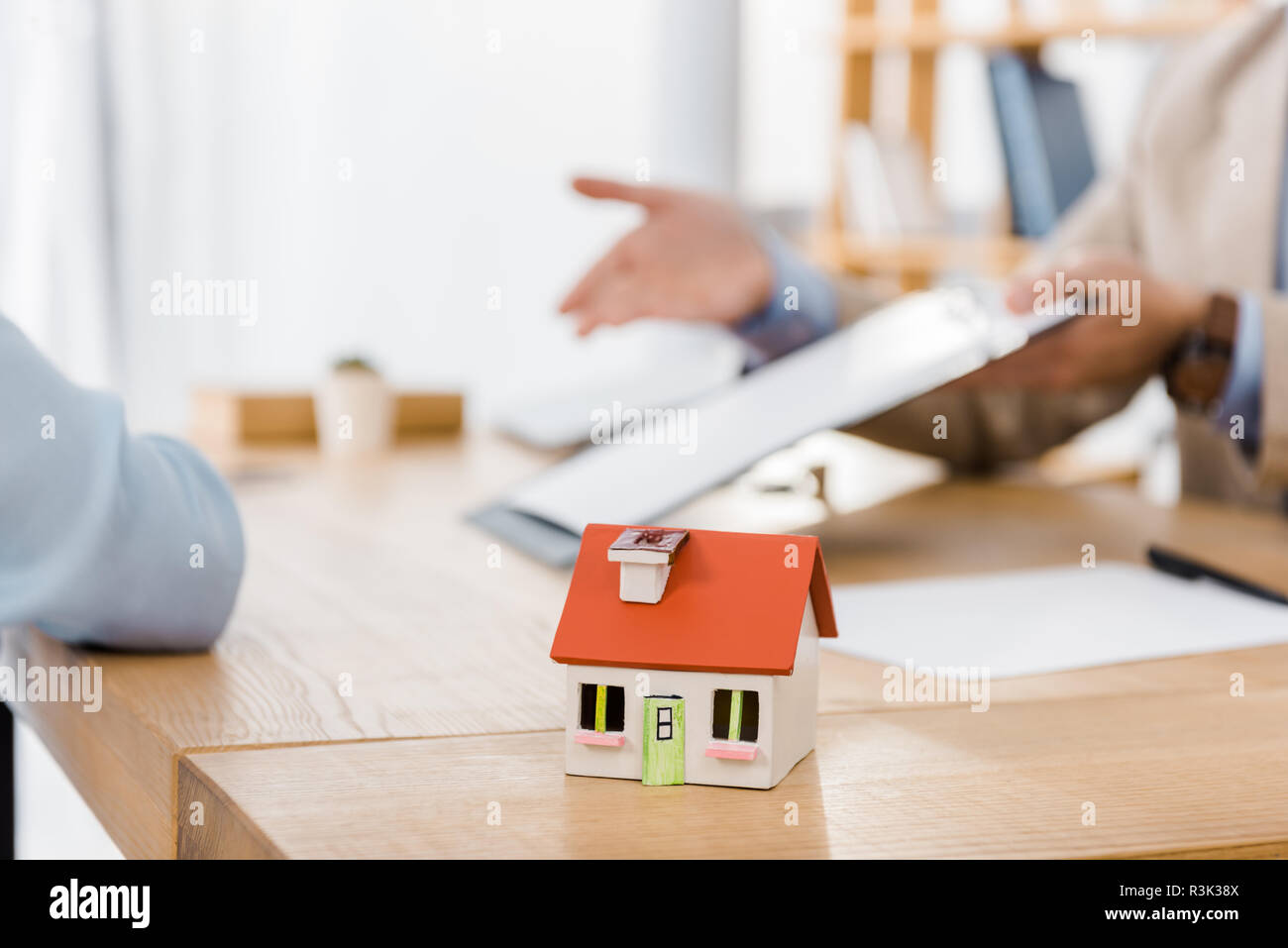 Business people meeting model house hi-res stock photography and images ...