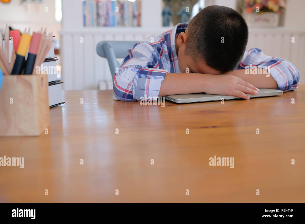 Kid Asleep At Desk Stock Photos & Kid Asleep At Desk Stock Images - Alamy