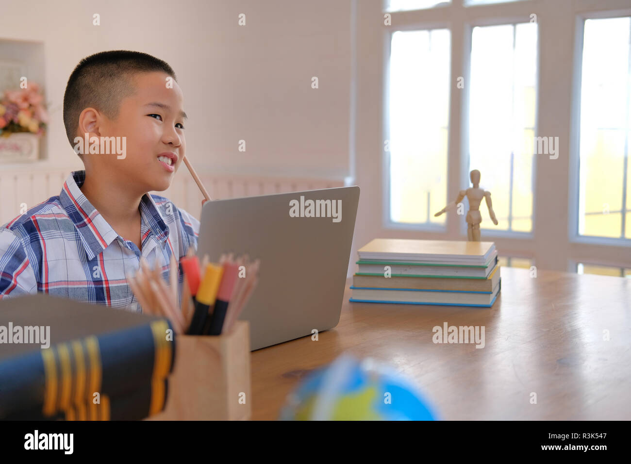 young little asian kid boy child children schoolboy thinking. childhood ...