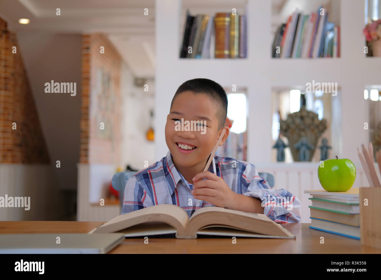 young little asian kid boy child children schoolboy thinking. childhood ...