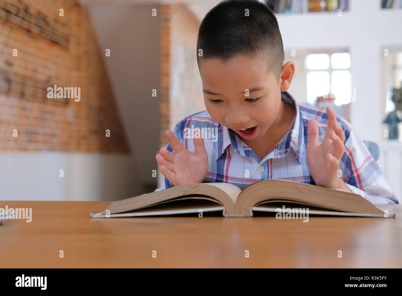 little asian kid boy child children with surprised shocked excited ...