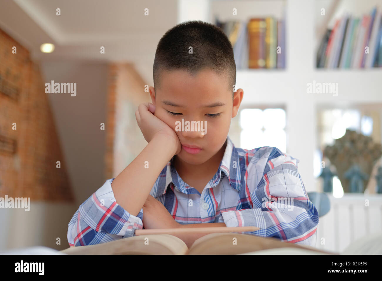 little asian kid boy child stressed tired frustrated bored from ...