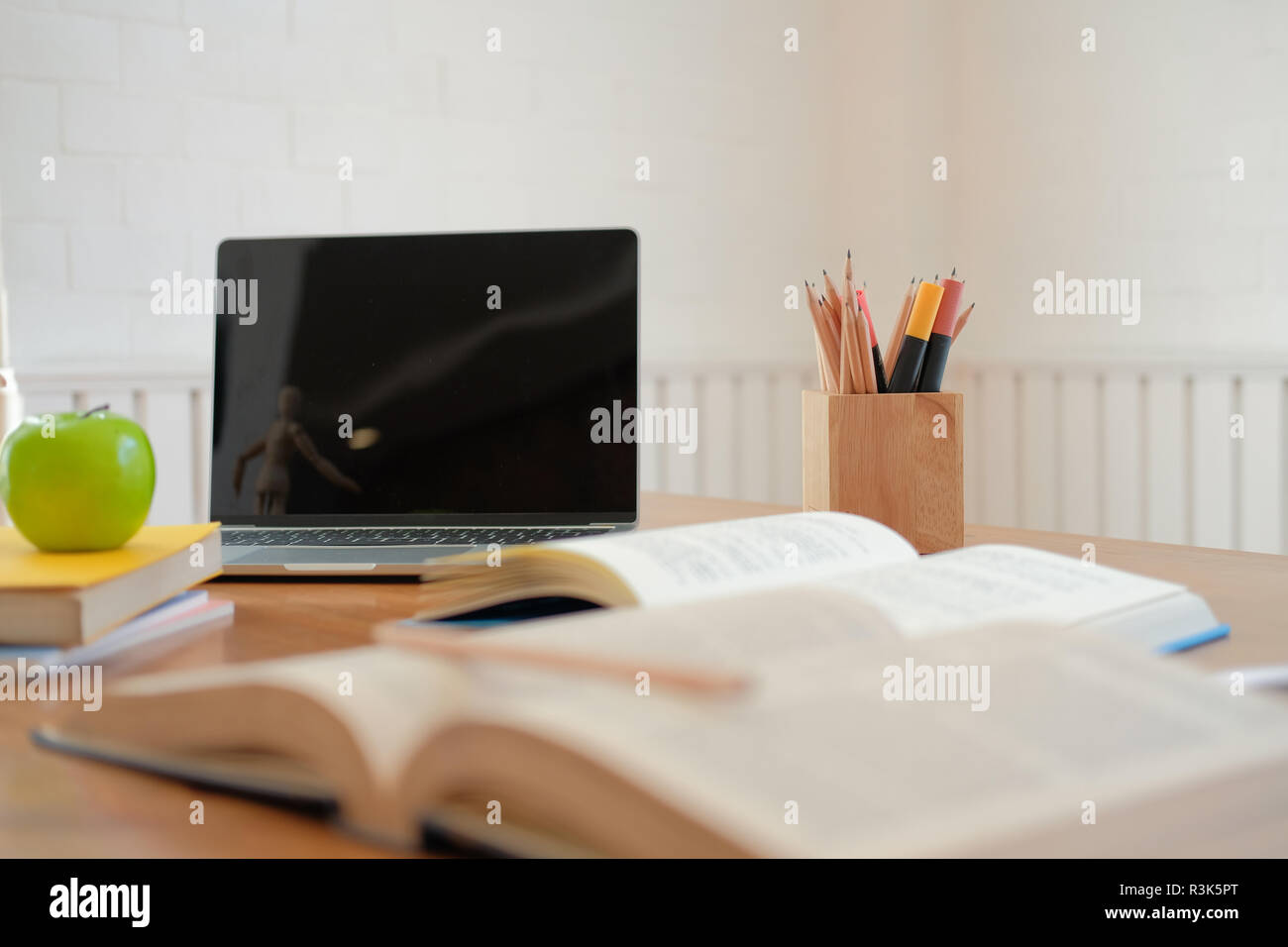 book computer on desk table school supplies for studying. back to ...