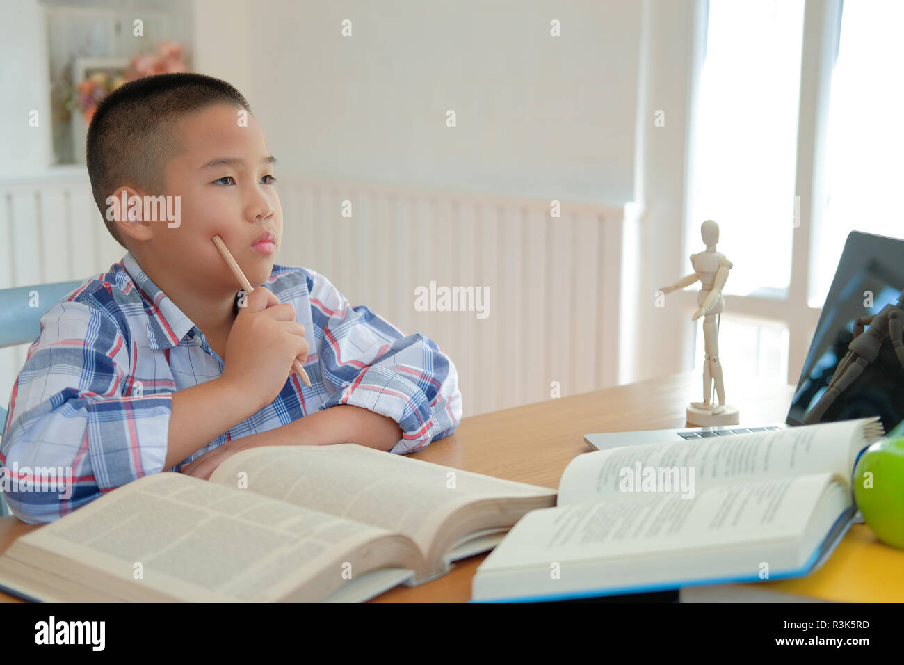 young little asian kid boy child children schoolboy thinking. childhood ...