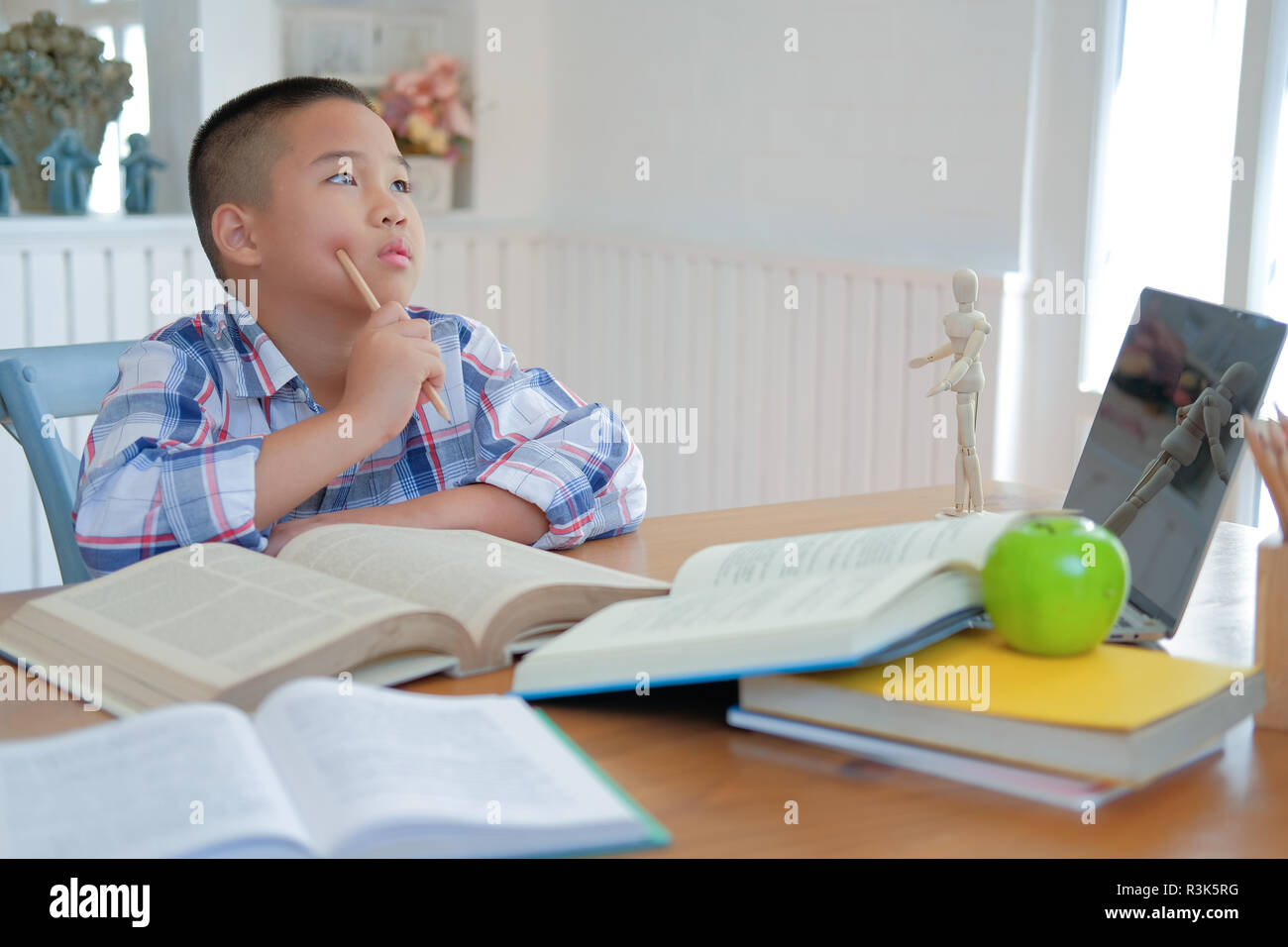 young little asian kid boy child children schoolboy thinking. childhood ...