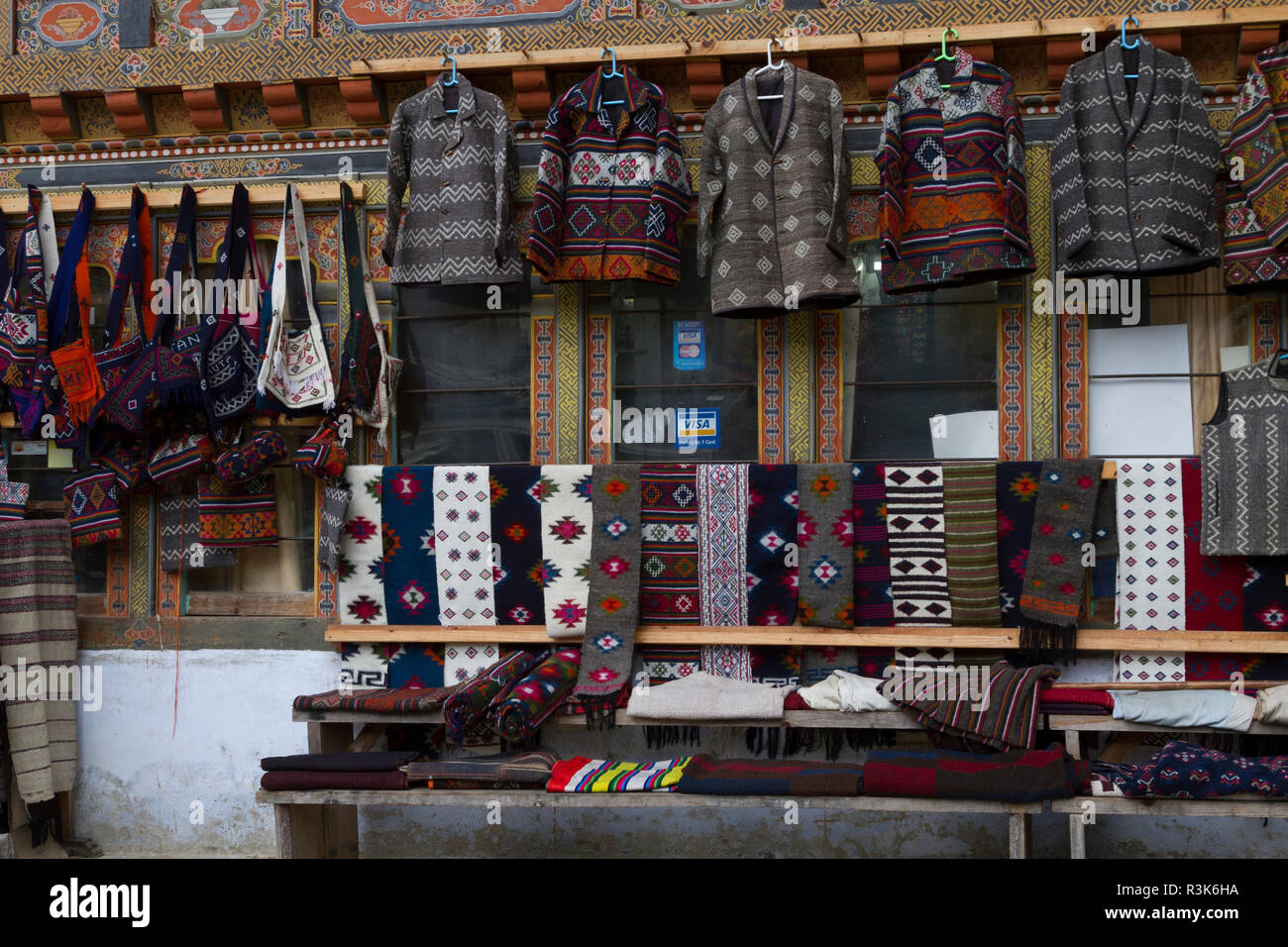 Bhutan. Shop selling traditionally woven clothing, bags and textiles in ...