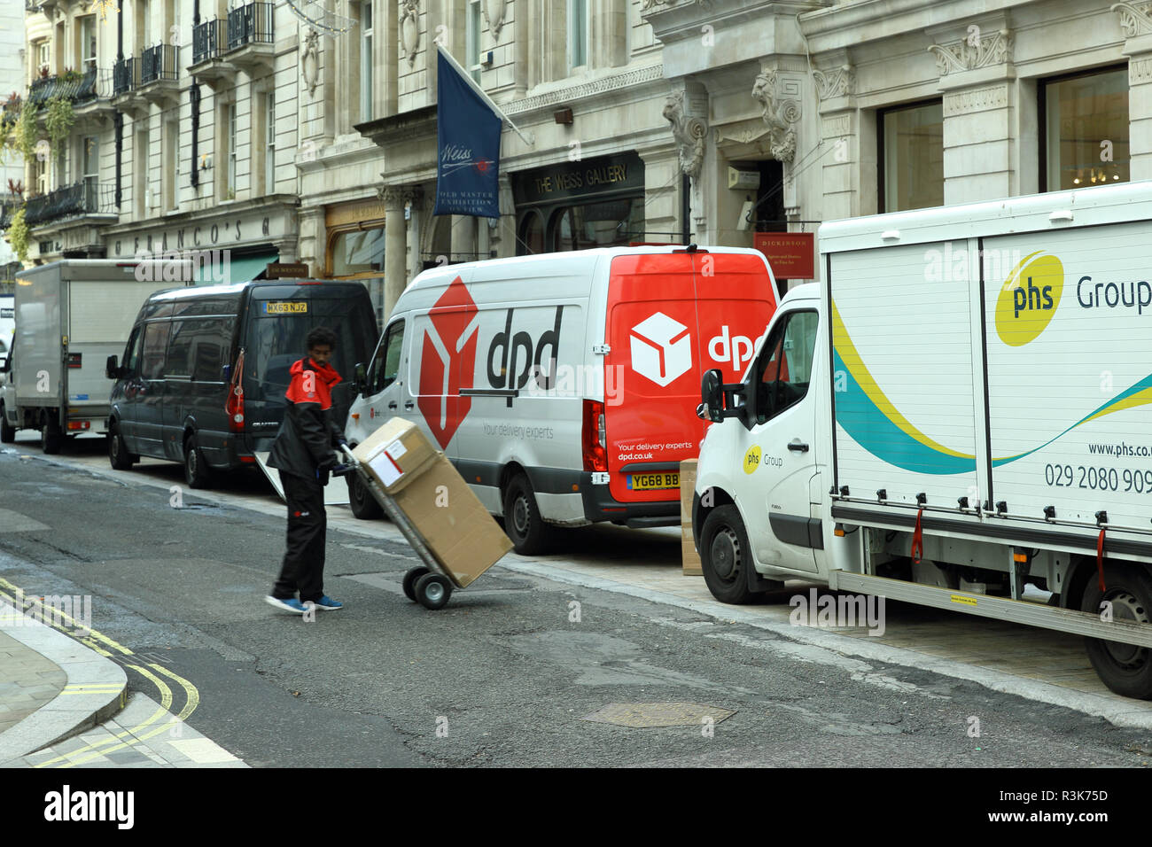 A day in the life of a parcel delivery courier Stock Photo - Alamy