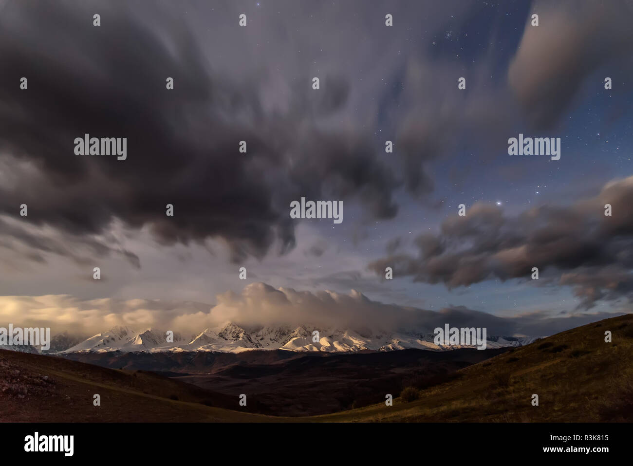 Amazing night landscape of the starry sky and beautiful clouds over the ...