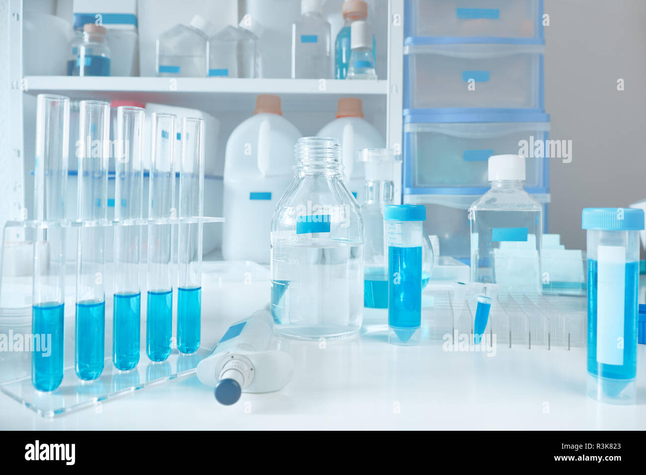 Scientific background in blue and white with research lab interior ...