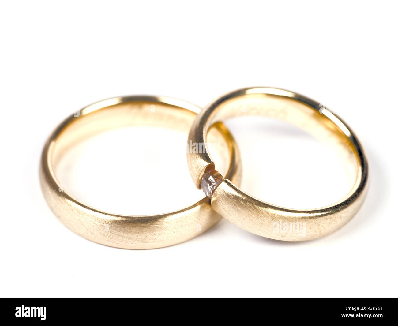 wedding rings on a white background Stock Photo - Alamy
