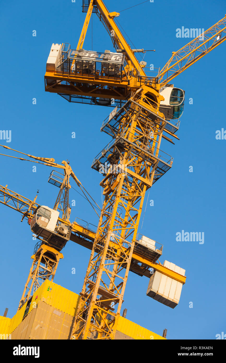 UAE, Downtown Dubai. Construction cranes Stock Photo - Alamy
