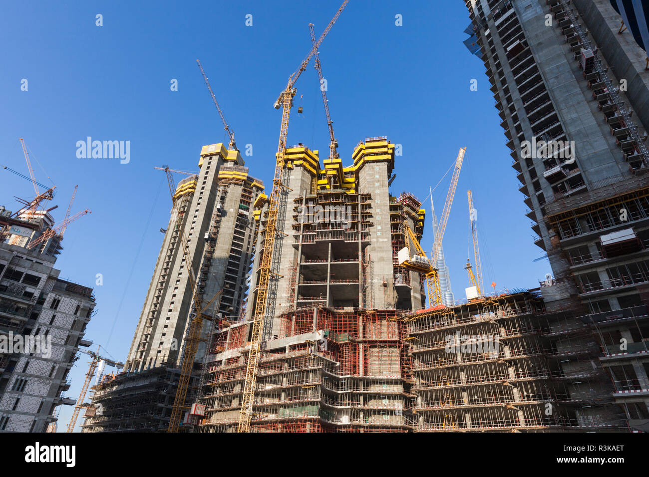UAE, Downtown Dubai. Construction cranes Stock Photo - Alamy