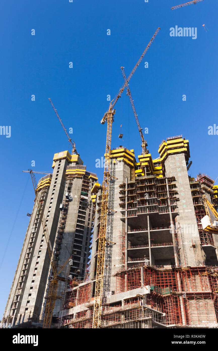 UAE, Downtown Dubai. Construction cranes Stock Photo - Alamy