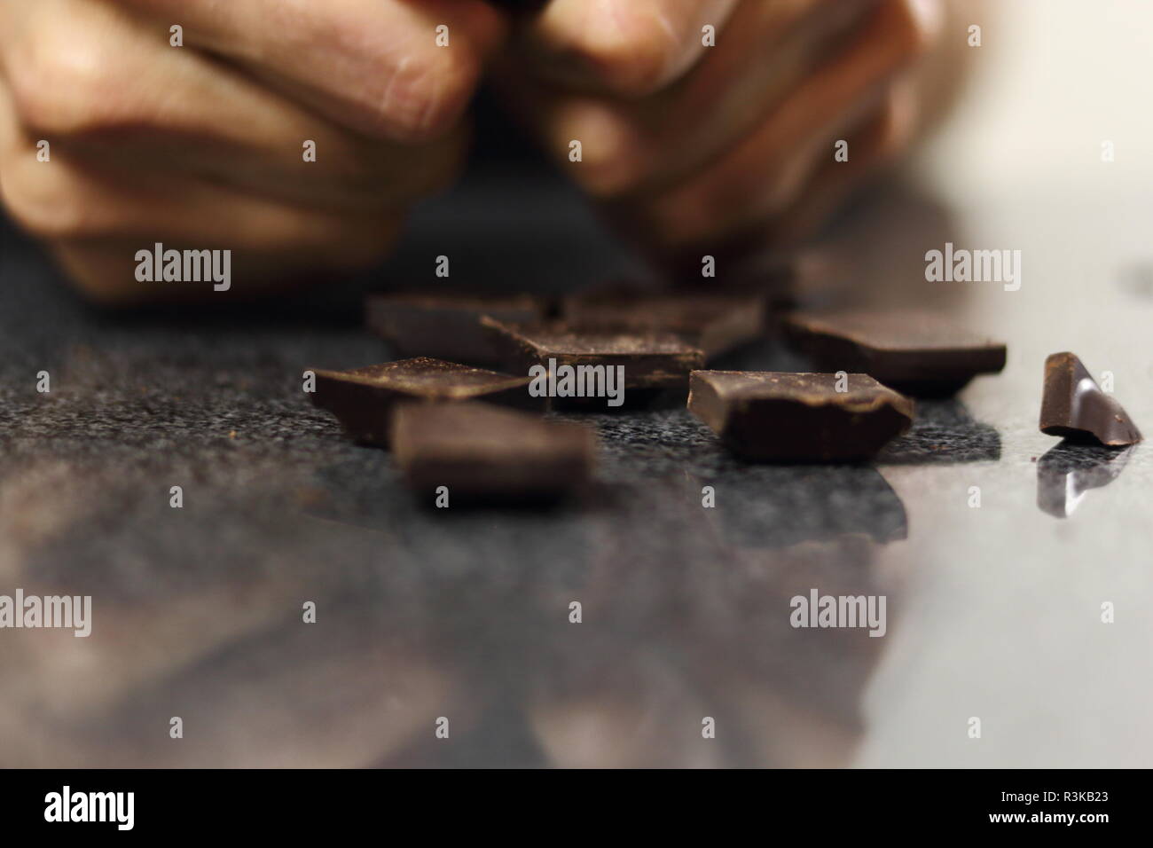 Breaking chocolate bar on pieces. Making Chocolate, Pear and Pecan Pie ...