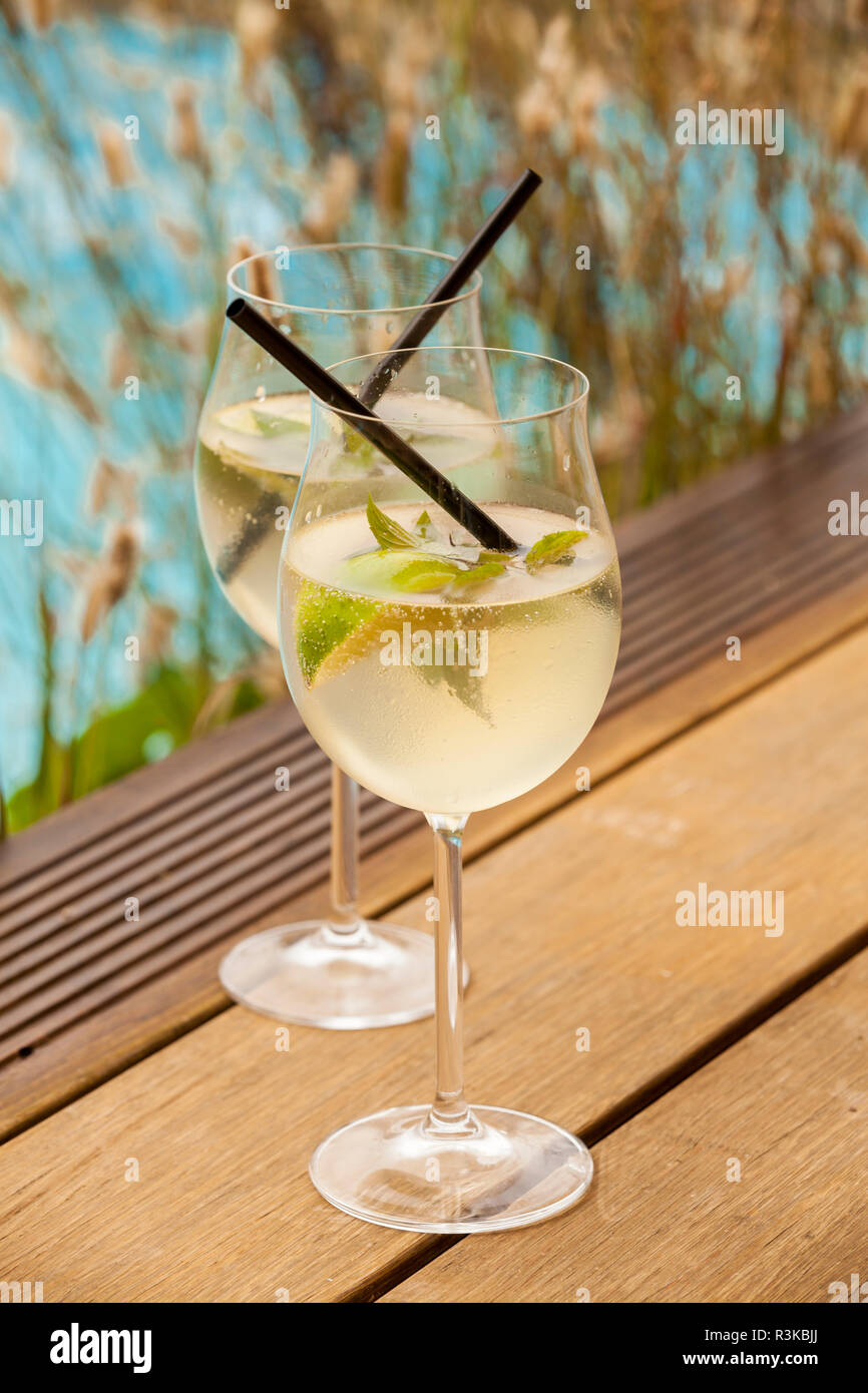 fresh hugo with mint lime and champagne in a weinglaÃŸ Stock Photo - Alamy