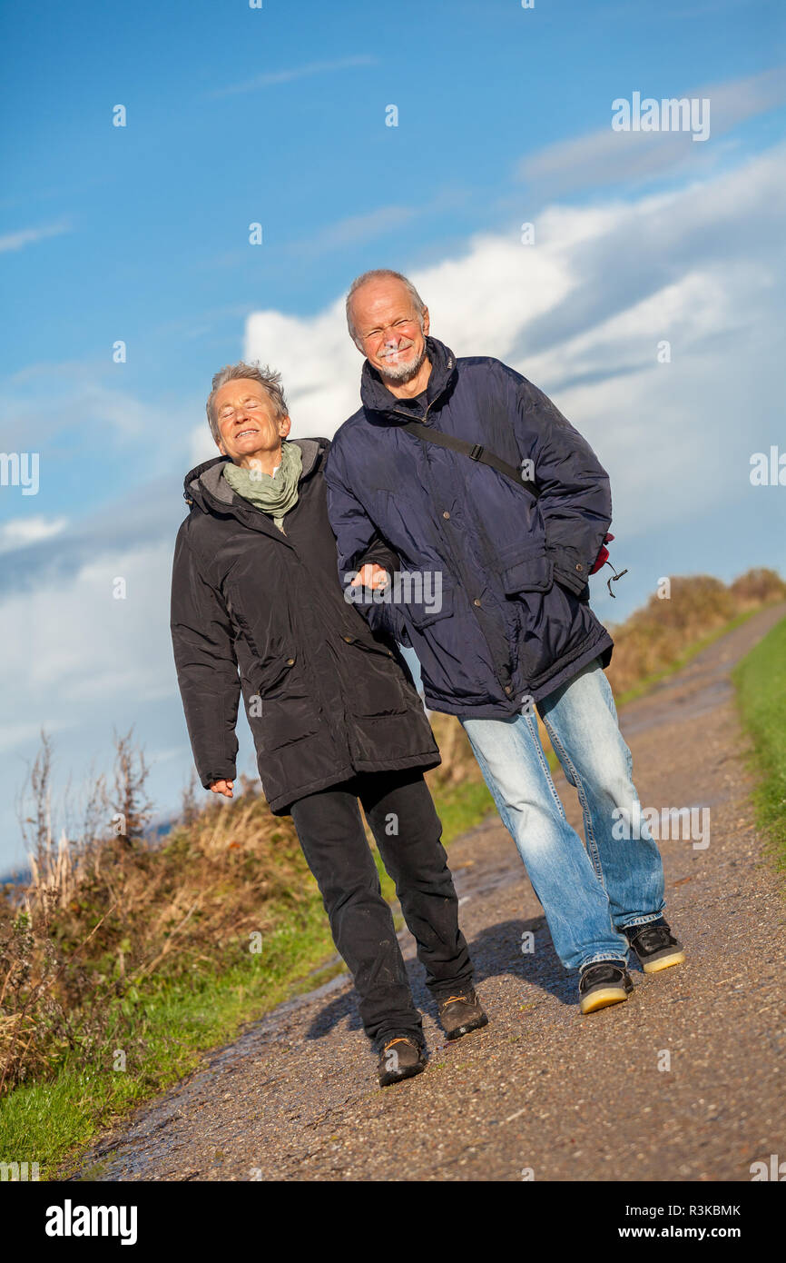 senior happy couple taking a walk Stock Photo - Alamy