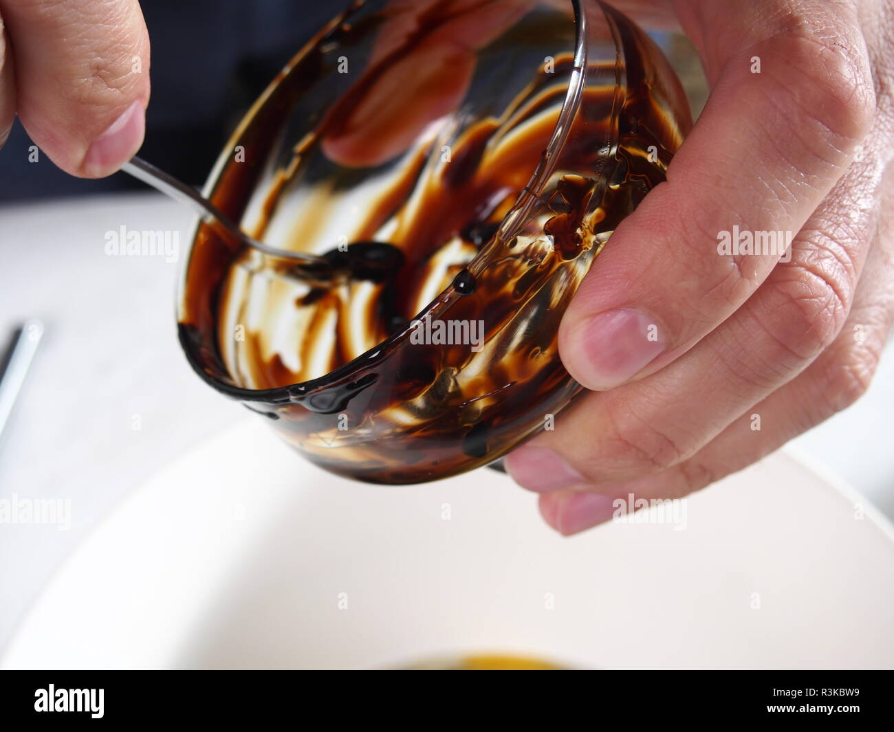 Adding Molasses into Egg Mixture. Making Treacle Pie Series Stock Photo ...