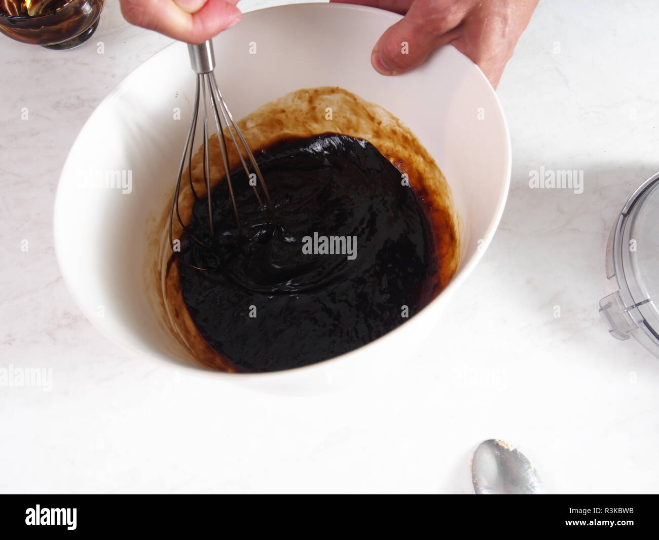 Whisking Molasses with Eggs. Making Treacle Pie Series Stock Photo - Alamy