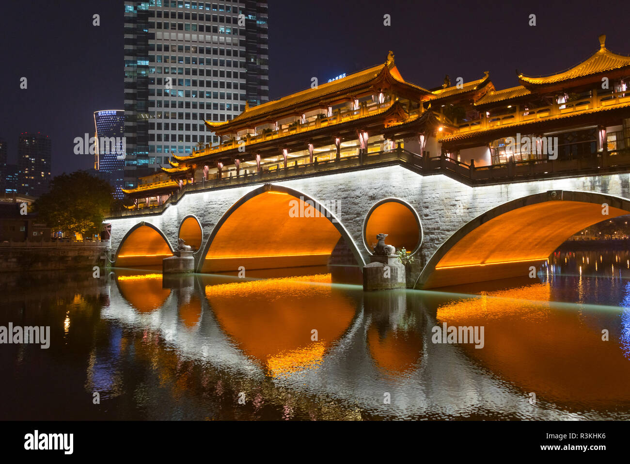 Night view of Anshun Bridge with reflection in Jin River, Chengdu ...