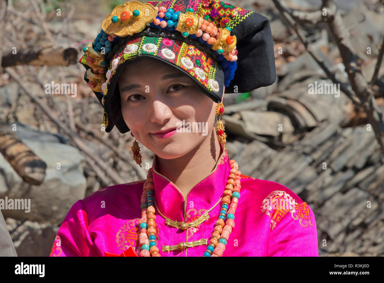 Tibetan girl in traditional clothing, Jinchuan County, Sichuan Province ...