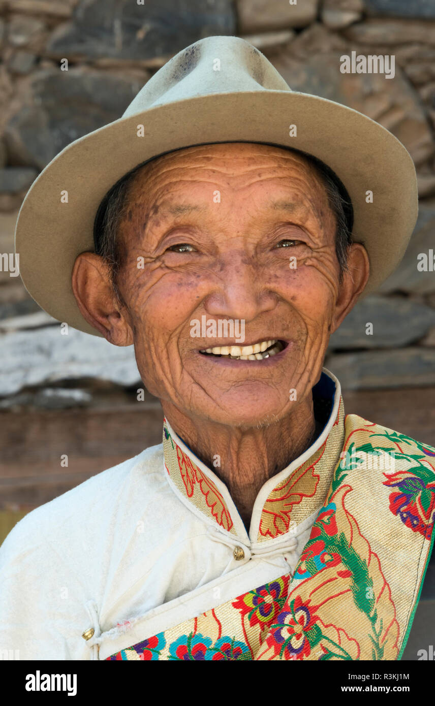 Tibetan man in traditional clothing, Jinchuan County, Sichuan Province ...