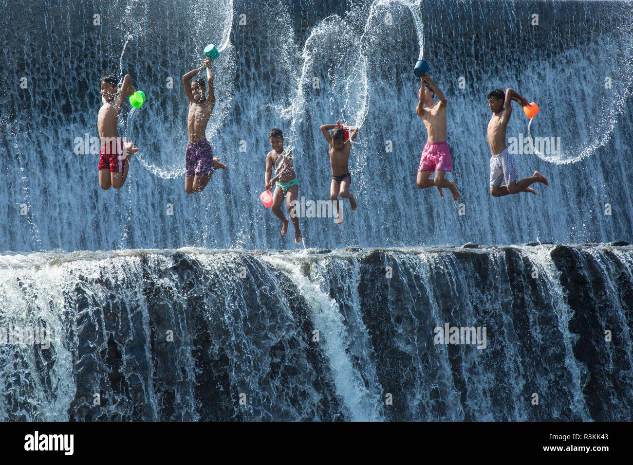 Boys playing waterfall hi-res stock photography and images - Alamy