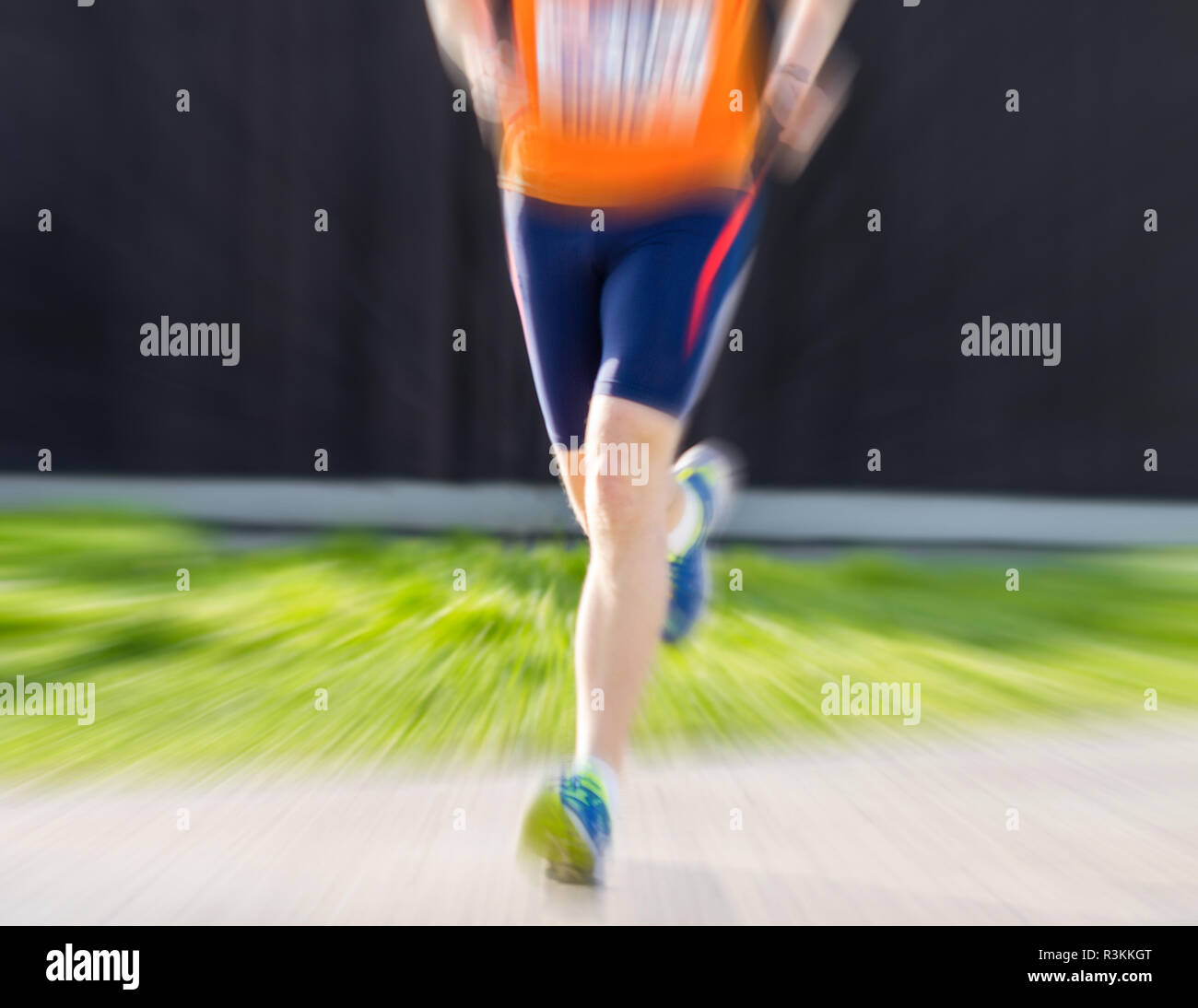 Warm up for the marathon. Male runner Stock Photo - Alamy