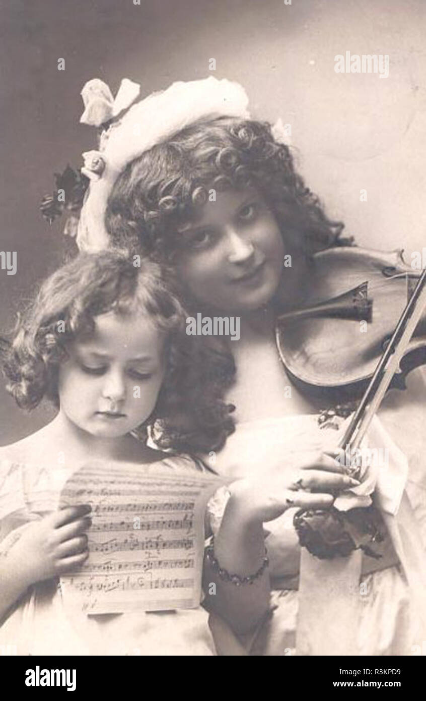 vintage classic Victorian image featuring children Stock Photo - Alamy