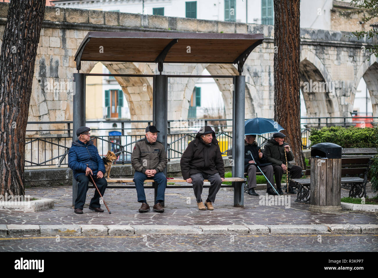 People waiting for bus in the Sulmona, Italy, Europe Stock Photo - Alamy