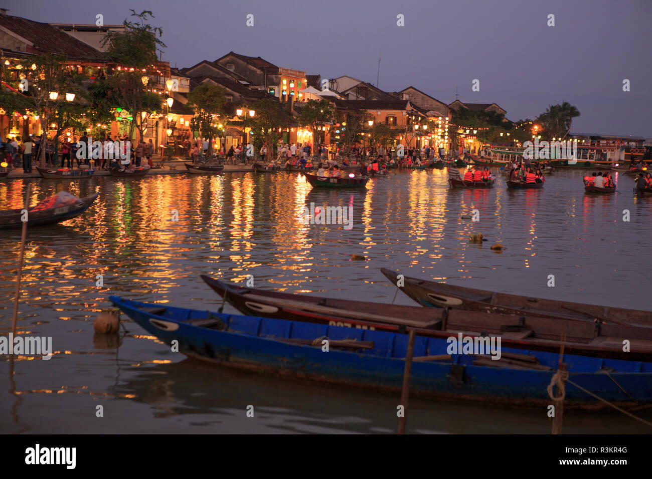 Wooden boats moored on the Thu Bon River opposite Bach Dang Street in ...