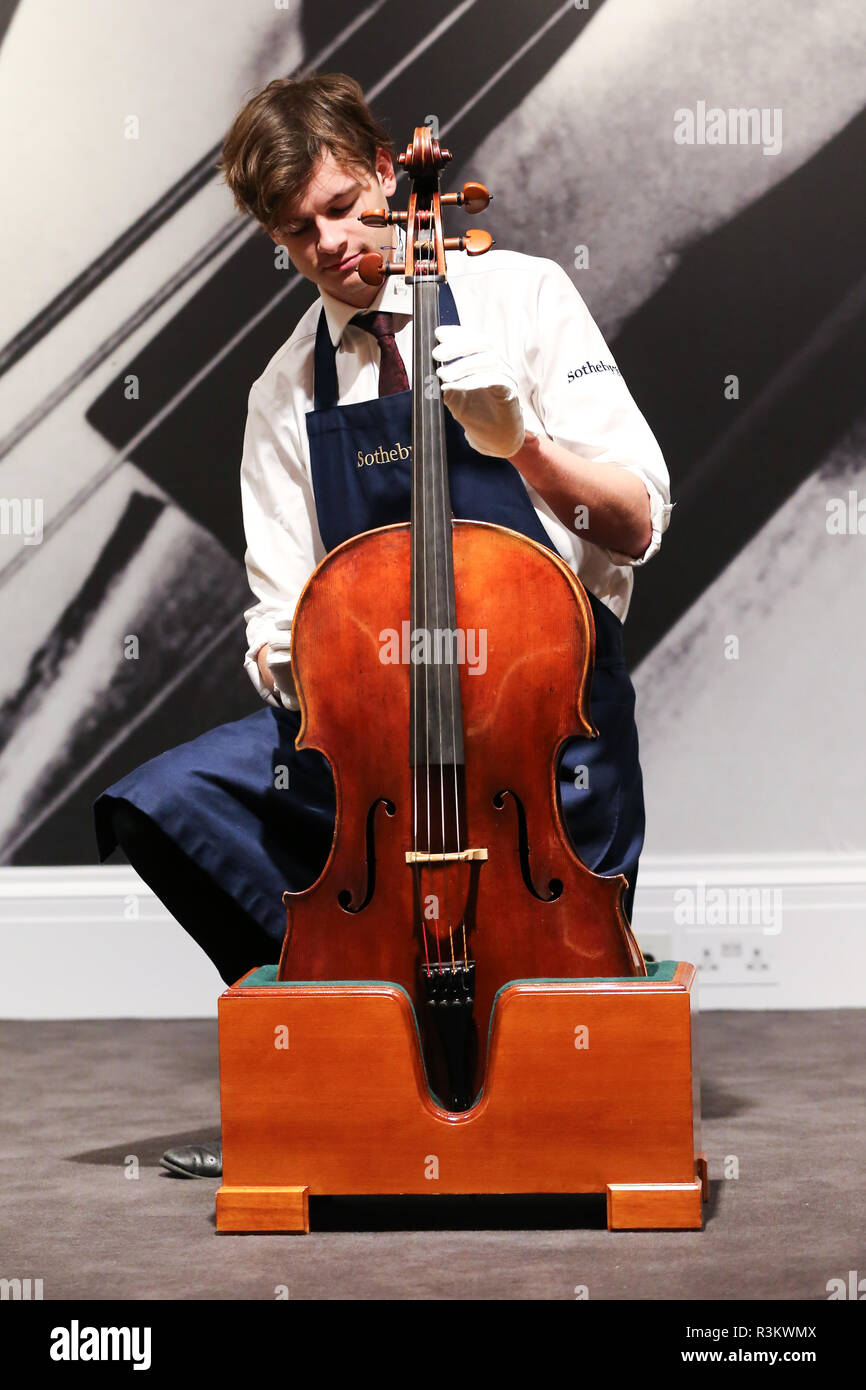 Sotheby's. London, UK. 23 Nov 2018 - A technician with A Cello, Turin ...