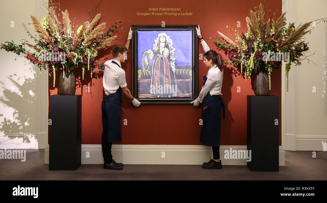 Sotheby's, London, UK 23 Nov 2018 - Technicians hang "Georgian Woman ...