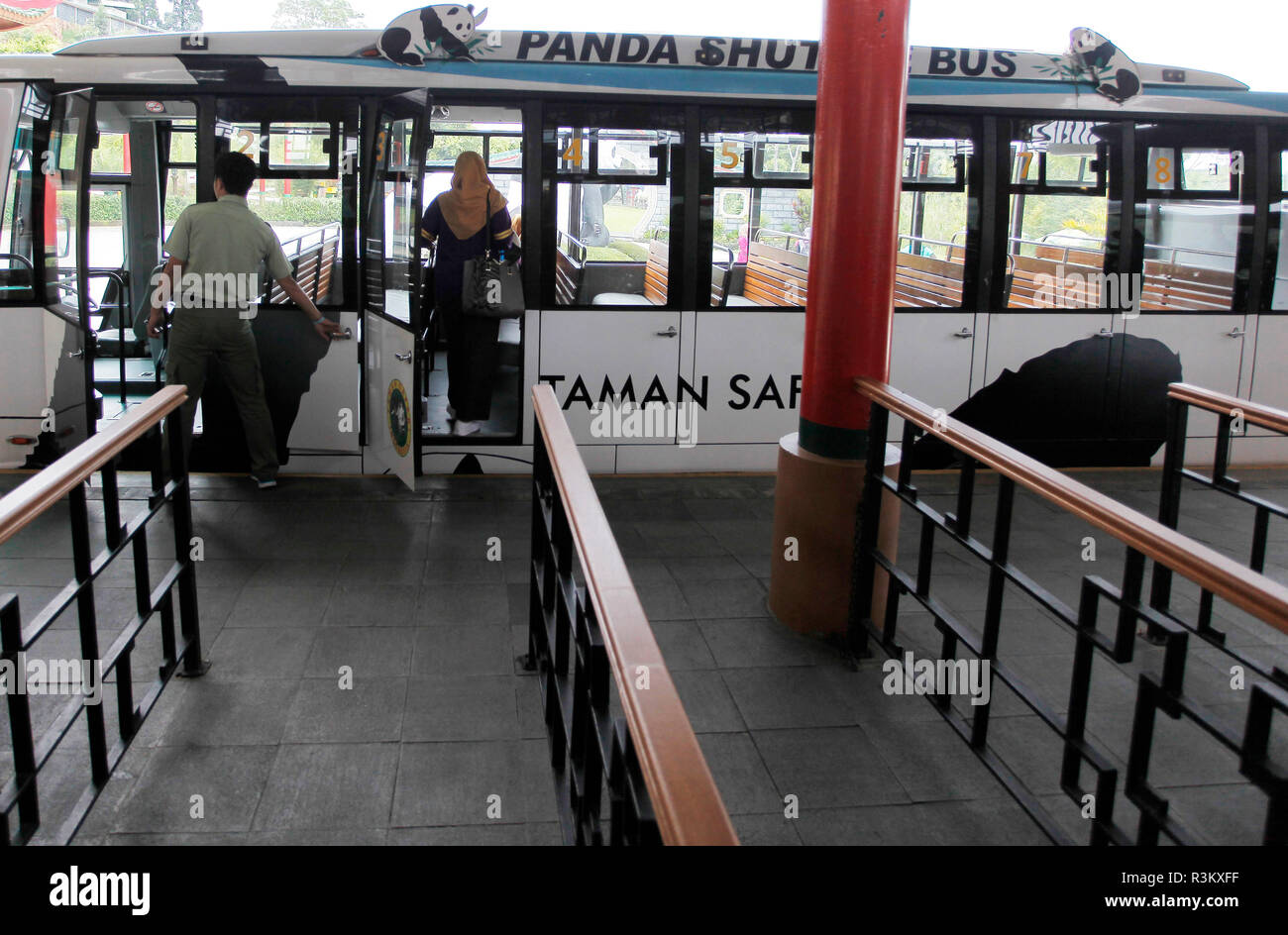 Local tourists can be seen boarding the Giant Panda shuttle bus at The ...