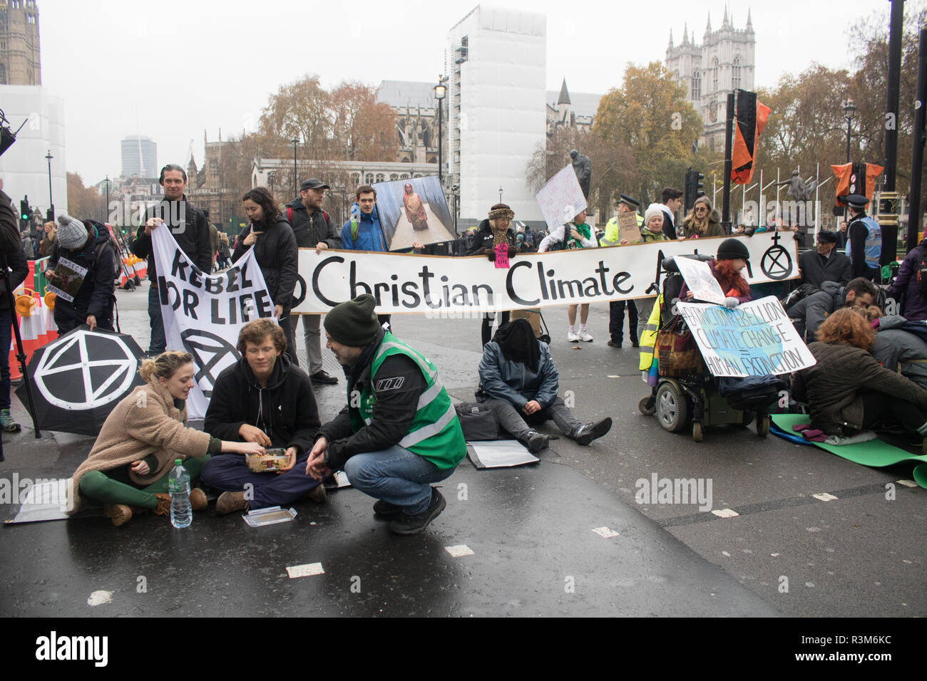 London UK. 24th November 2018. Climate change activists from Extinction ...