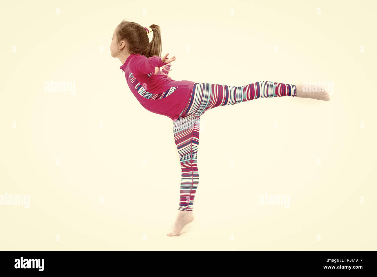 Fitness and health. Workout of small girl isolated on white background ...