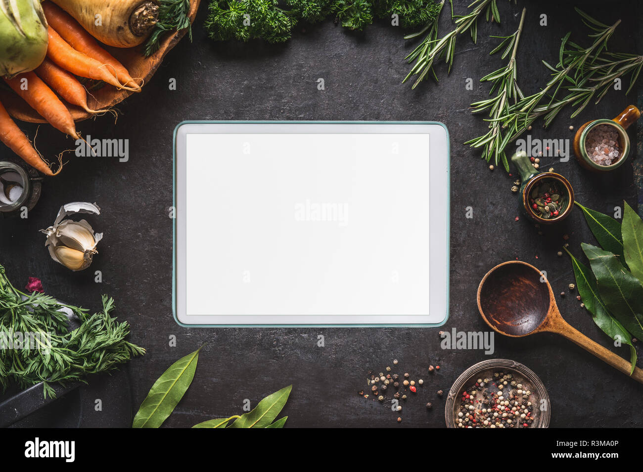 Food cooking and healthy eating background with tablet pc with empty ...