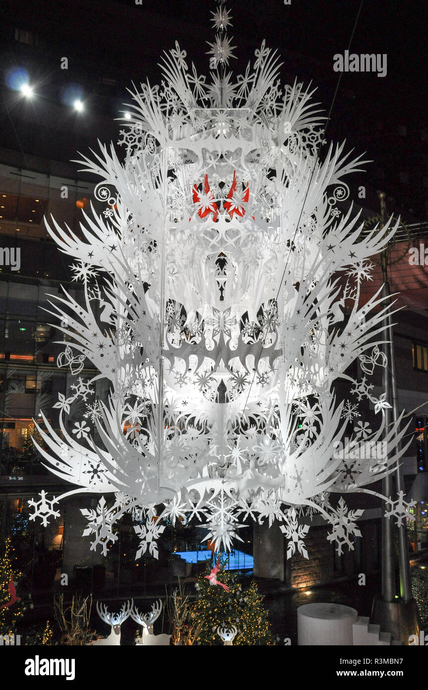 Christmas tree made out of paper and christmas decorating illumination ...