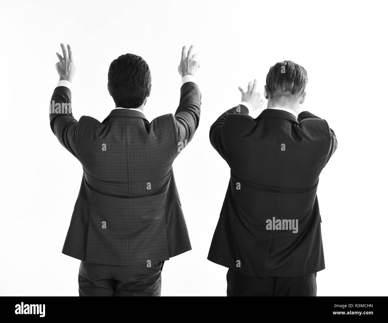 Men in suit or businessmen raise hands pretend to climb or manipulate ...