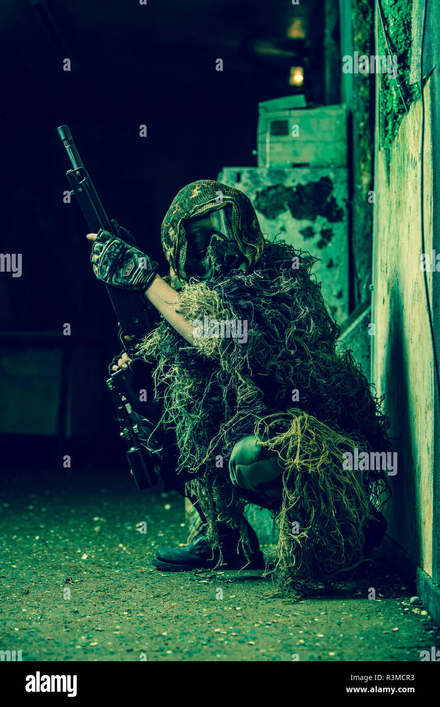 Sniper woman paintball Stock Photo - Alamy