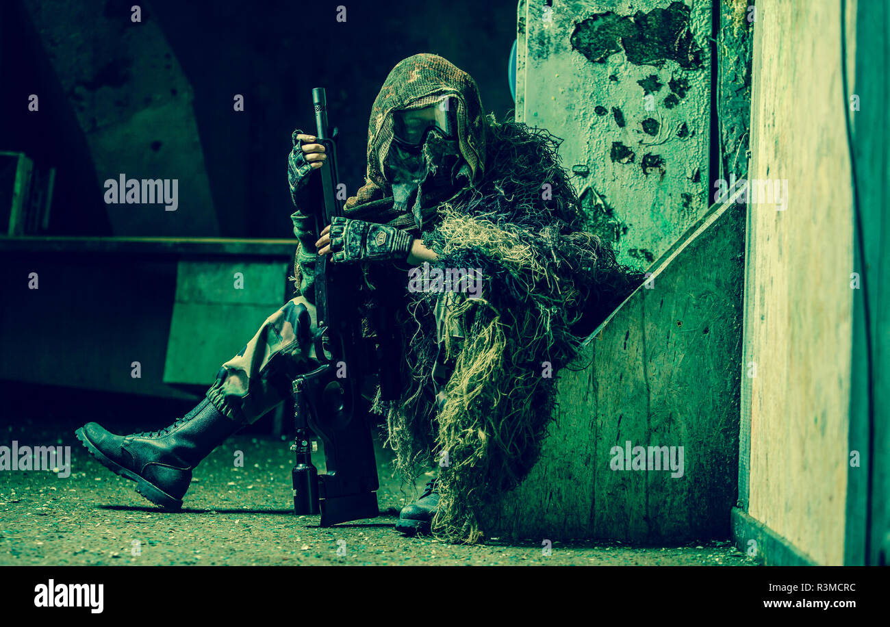 Sniper woman paintball Stock Photo - Alamy