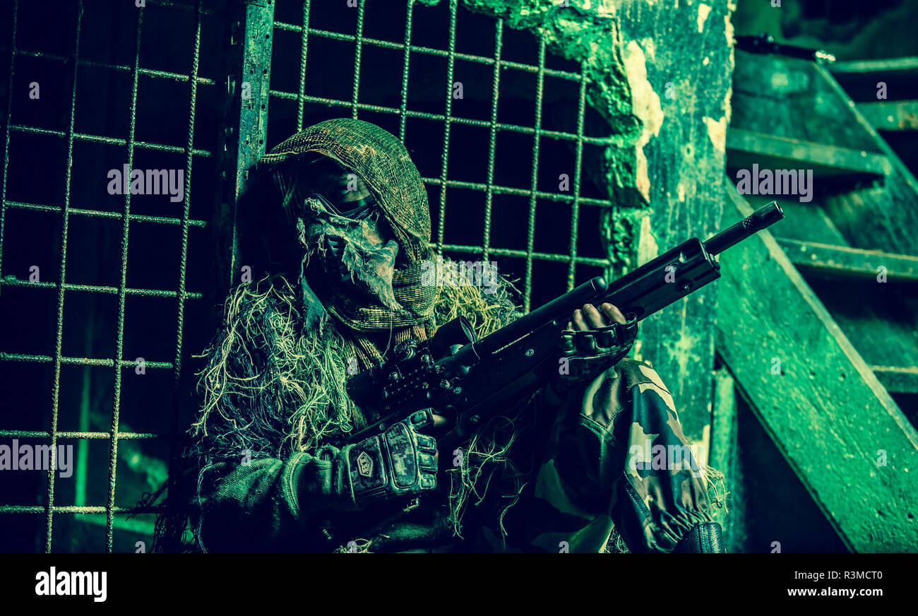 Sniper woman paintball Stock Photo - Alamy
