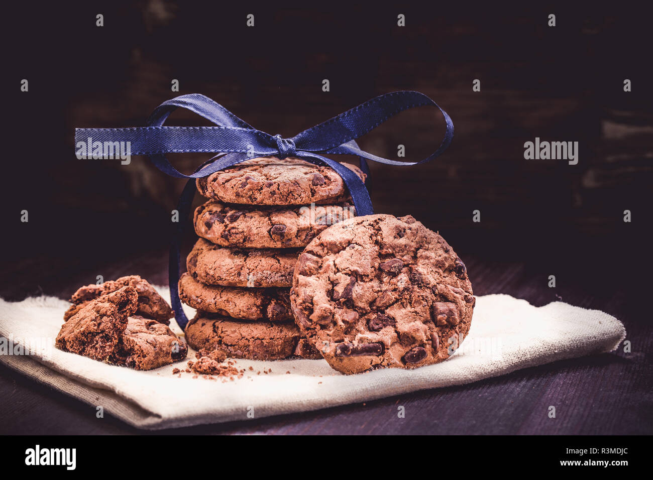 fresh cookies stacked with a bow tied together with background Stock ...