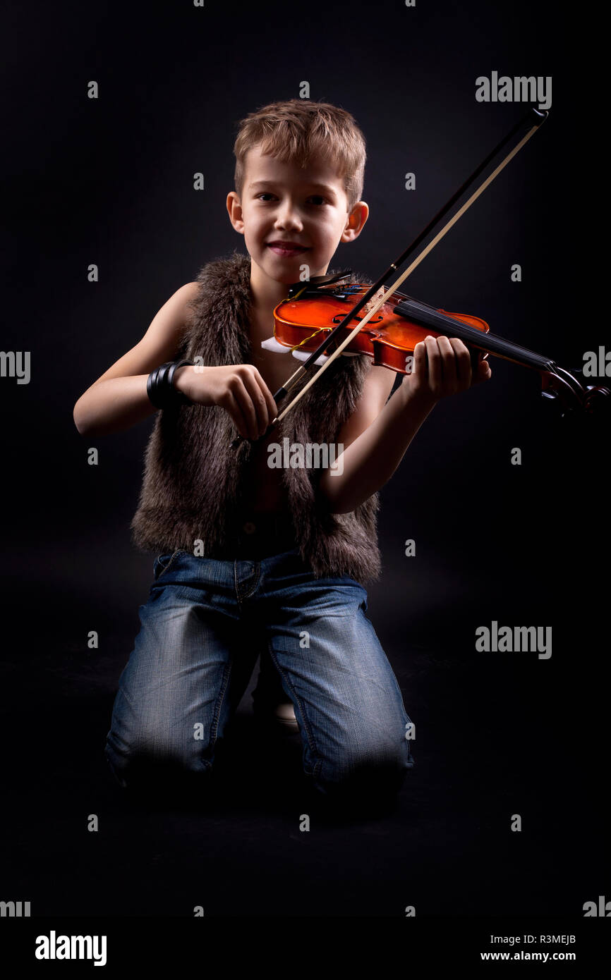 Boy plays violin hi-res stock photography and images - Alamy
