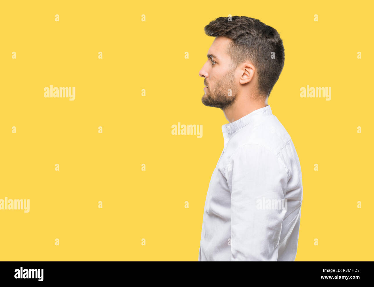 Young handsome man over isolated background looking to side, relax ...