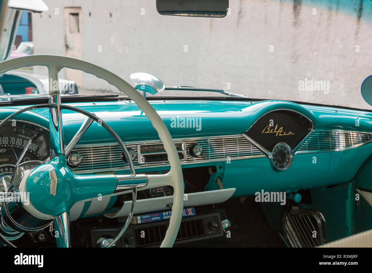 Cuba, Havana. Teal dashboard and steering wheel in classic car. Credit ...