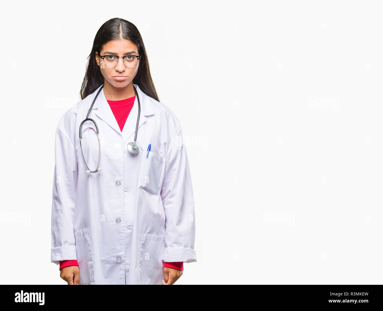 Young arab doctor woman over isolated background depressed and worry ...