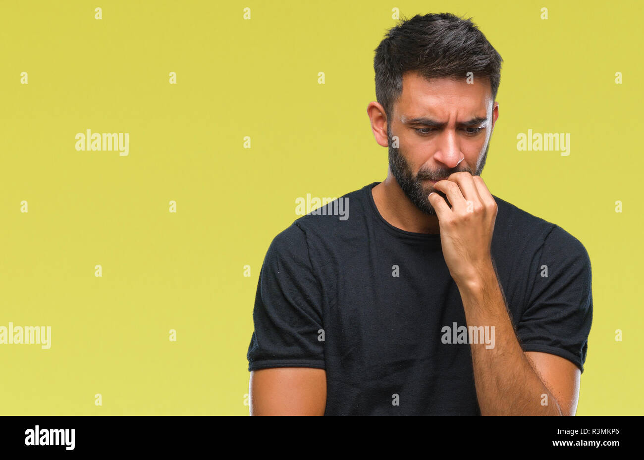 Adult hispanic man over isolated background looking stressed and ...